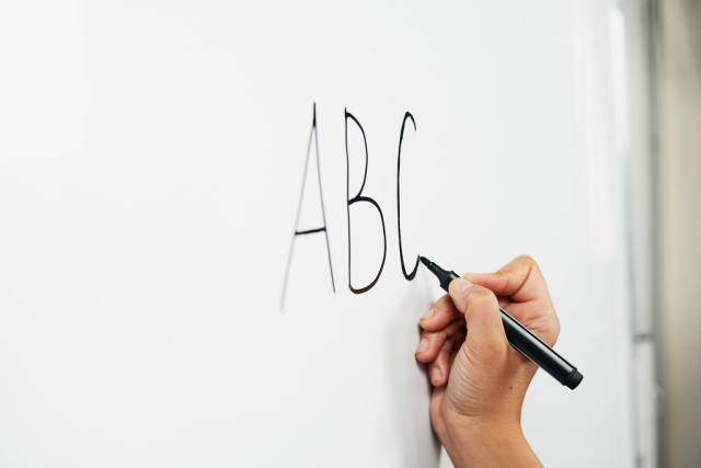 Learning English Alphabet A Teacher Starting First English Lesson For 